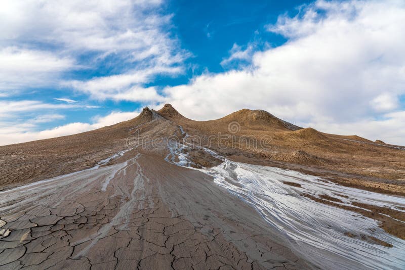Mud volcano eruption scene stock photo. Image of erupting - 208156862