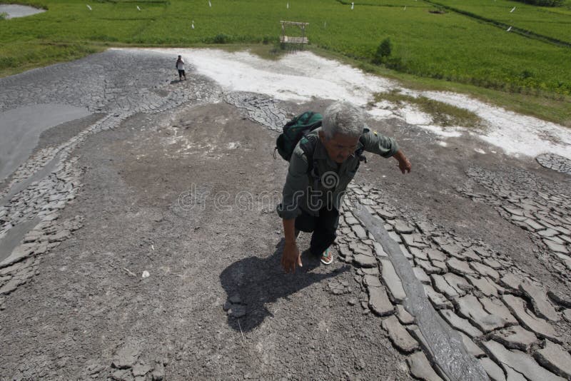 Mud volcano editorial stock photo. Image of central, crater - 40886813