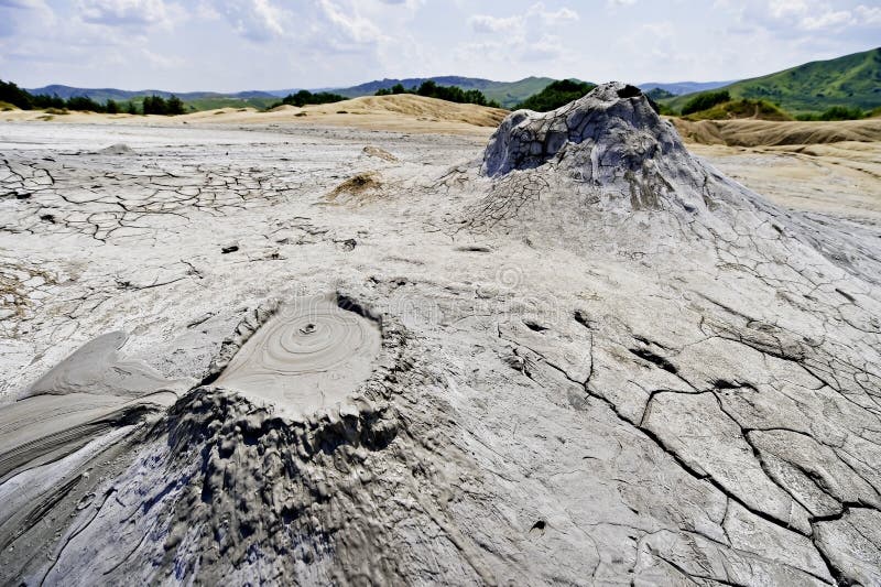 Mud volcanoes erupting stock photo. Image of boil, geothermal - 74327132