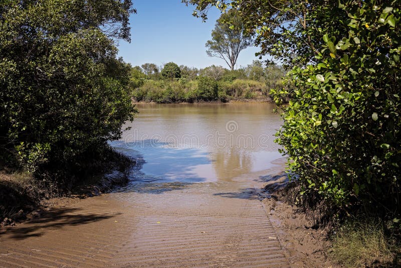 Muddy Boat Ramp stock photo. Image of nature, reflections - 212758160