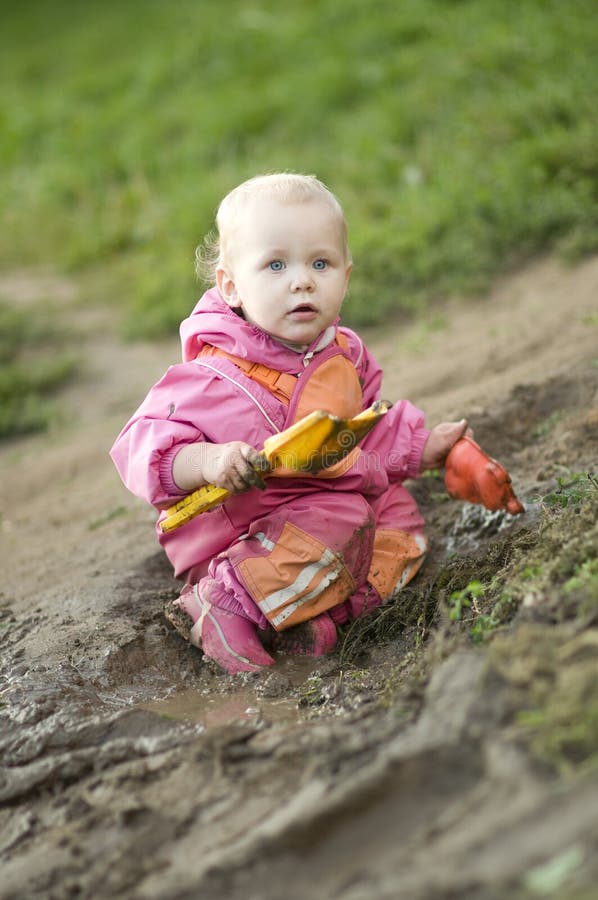 Muddy Child stock image. Image of hand, grass, dirty - 13251745