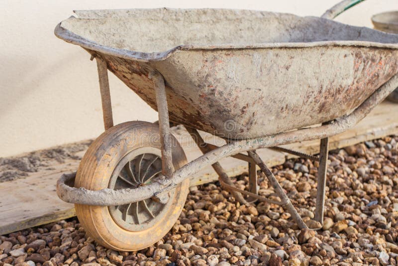 A Muddy Construction Site Wheelbarrow Stock Photo - Image of work ...