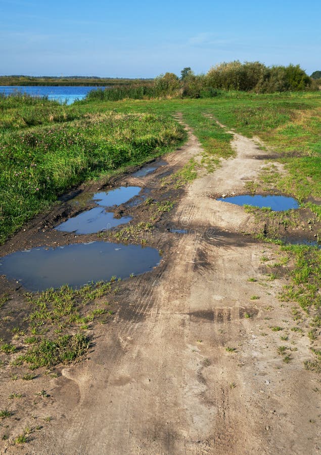 Muddy countryside road stock photo. Image of rural, dirt - 161861888