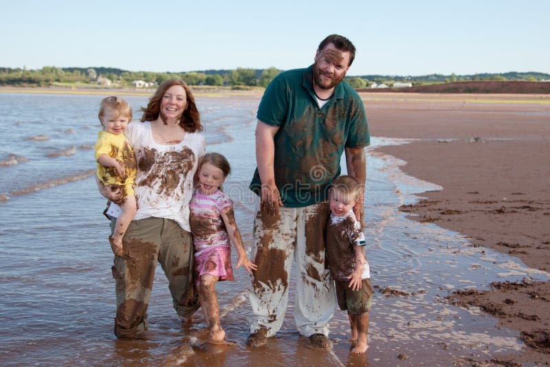 Mother and Kids Playing in Mud Stock Image - Image of family, playful ...