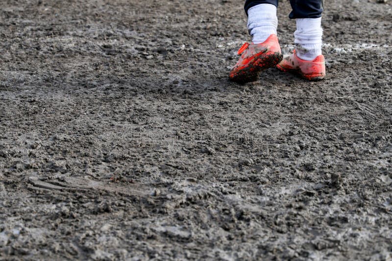 Muddy Football Field with Muddy Player Stock Photo - Image of running ...
