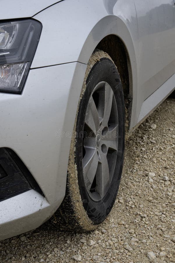 Muddy Grey Car Tire on Cloudy Day Stock Photo - Image of wheel ...