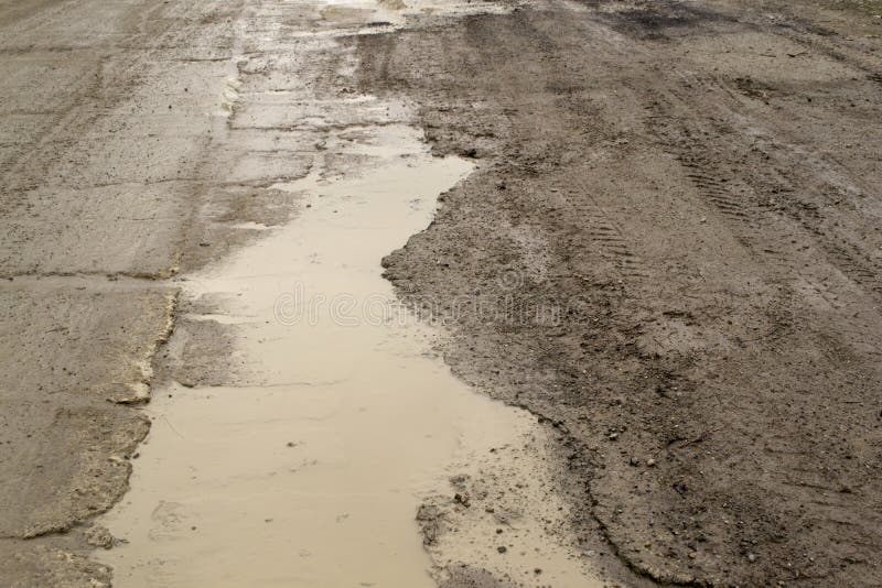 Car ruts in dirty road mud stock image. Image of loam - 40934231