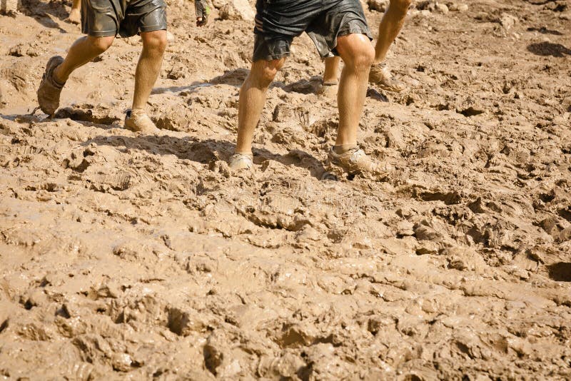 Running, Mud, and Obstacle Course Editorial Stock Image - Image of ...