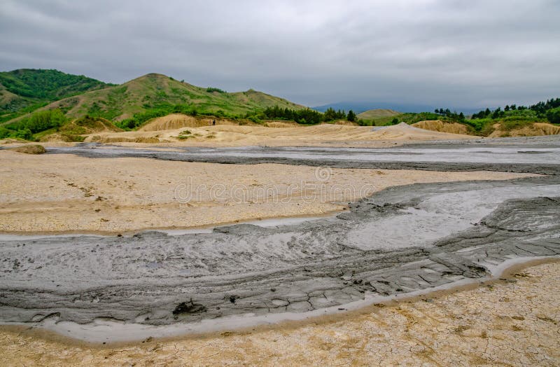 Muddy Water Has Formed a Substantial Sand Puddle Stock Photo - Image of ...