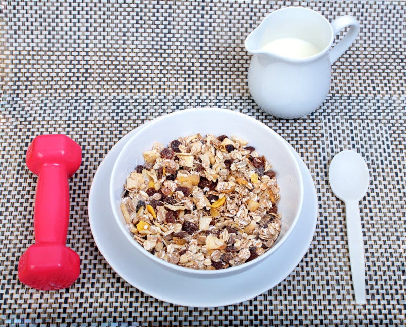 Muesli Breakfast in Transparent Package.Spoon, Dumbbell and Milk Stock ...