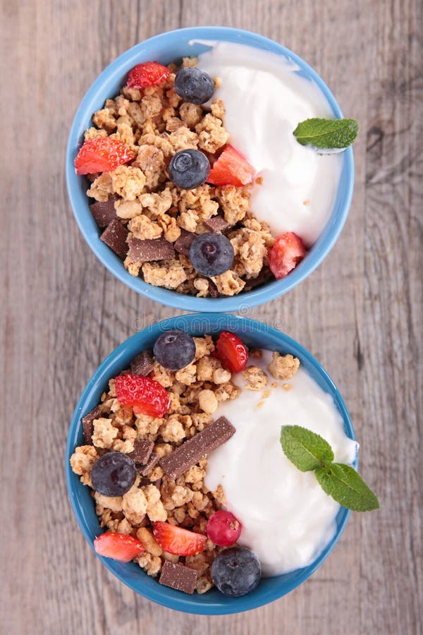 Muesli, yogurt and berry stock image. Image of cream - 41871839