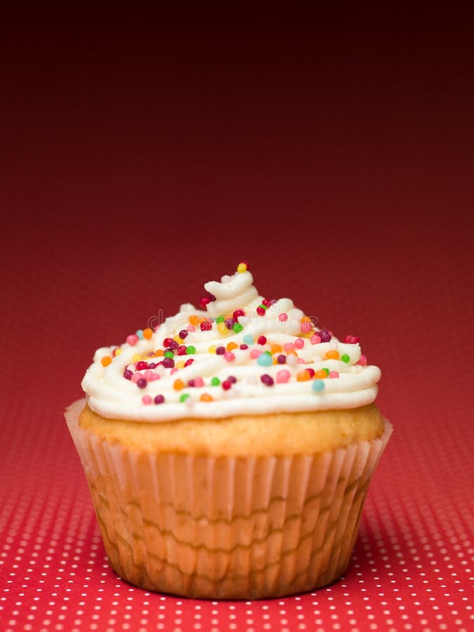 Muffin with colorful candy stock photo. Image of cream - 28005700