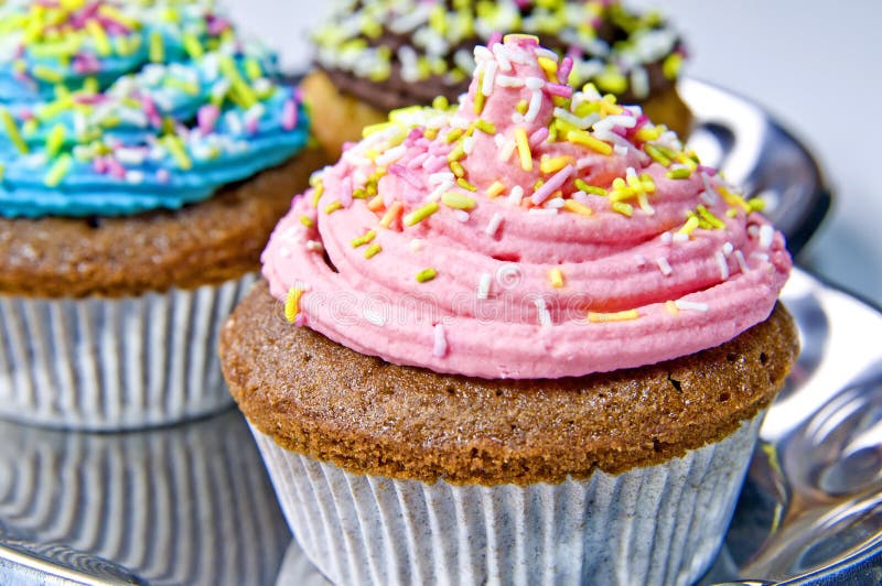 Muffin Decorated with Pink Cream Stock Photo - Image of dessert, dough ...
