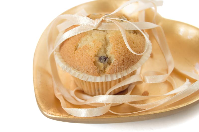 Muffin on a gold plate stock image. Image of sweet, gold - 7470115