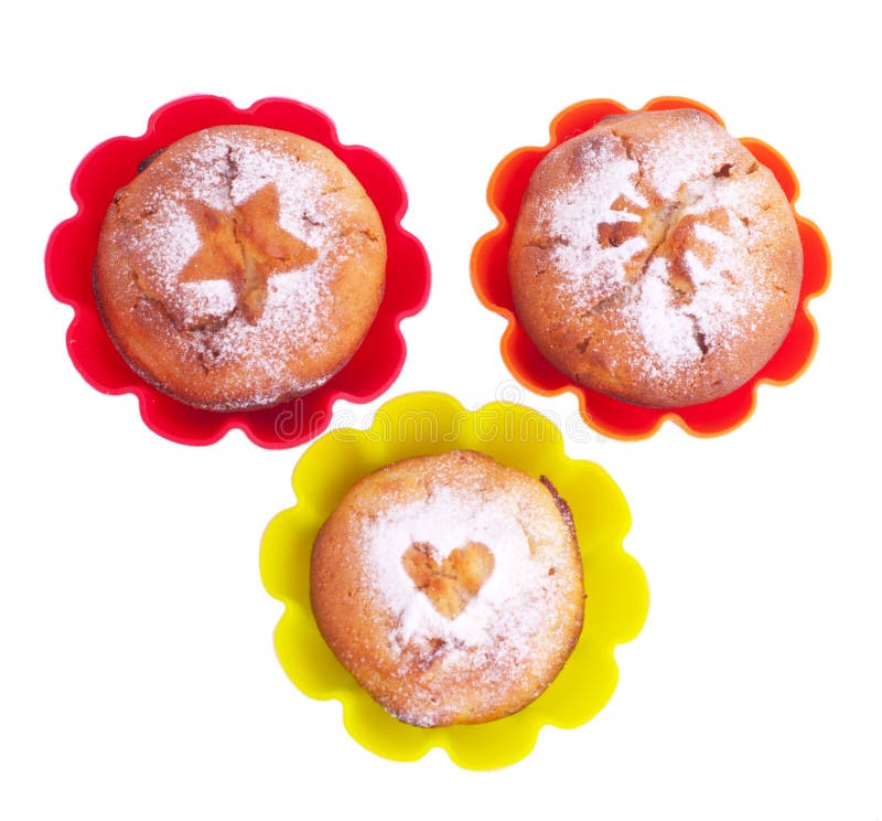 Muffin with Icing Sugar Star, Heart and Sun in Color Forms Stock Photo ...