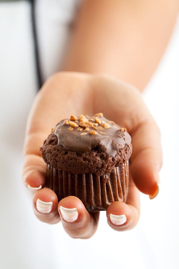 Muffin in woman s hand stock photo. Image of close, beautiful - 48823066