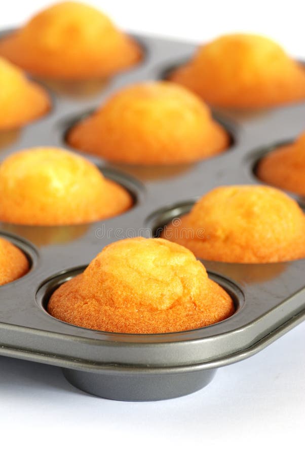 Muffins on baking tray stock photo. Image of bakery, food - 4194006