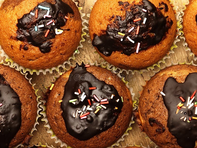 Muffins with Chocolate Icing. Stock Photo - Image of bake, berry: 50049174