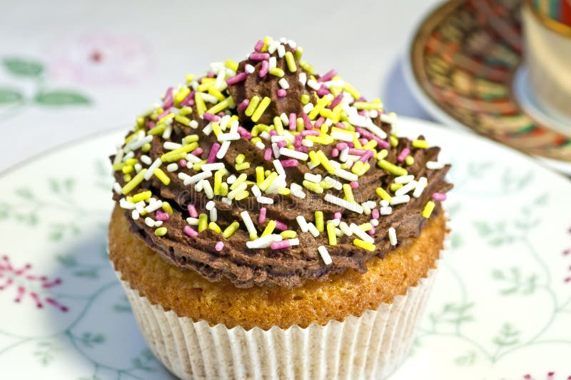 Muffins with colored cream stock photo. Image of bakery - 28844258