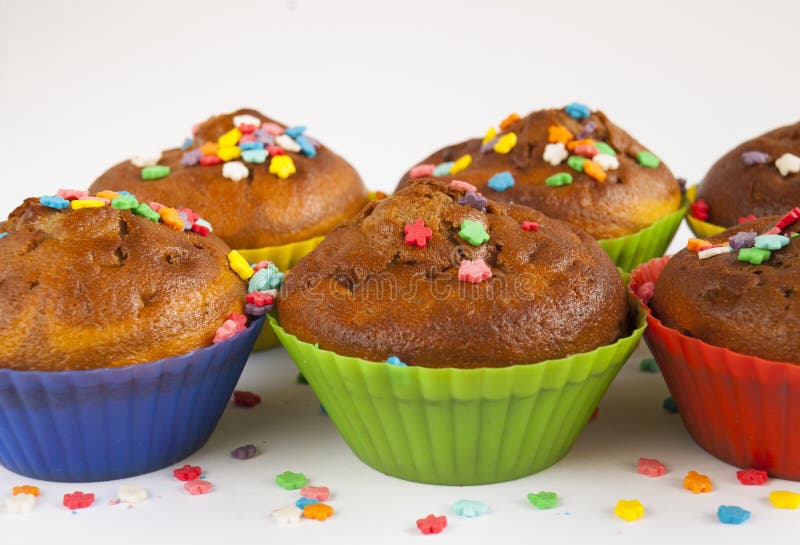 Muffins Decorated with Colored Powder Stock Photo - Image of figurines ...