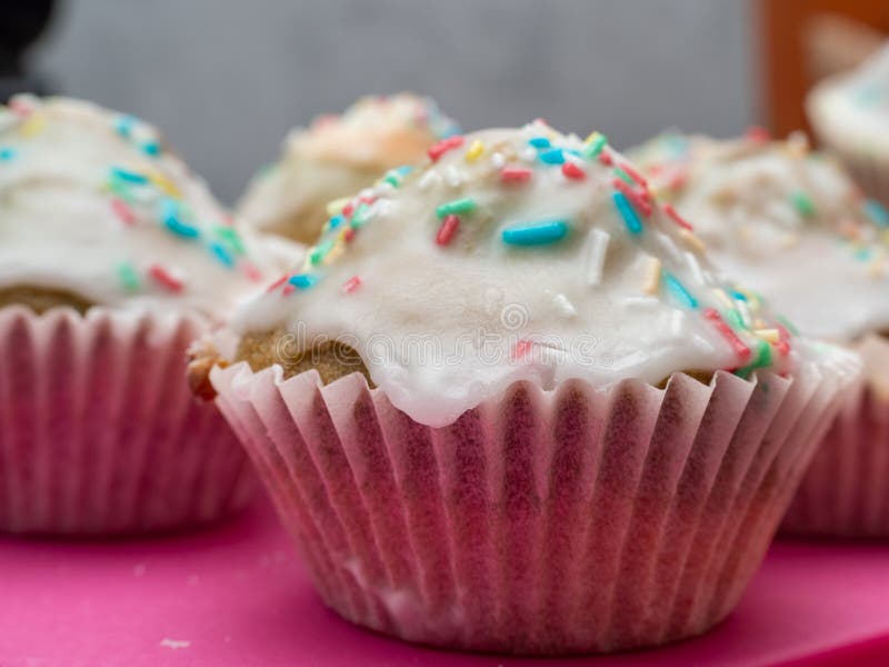 Muffins with icing stock image. Image of frosting, fresh - 239041055