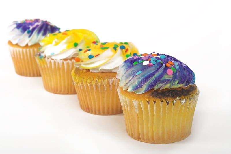 Muffins in a row stock photo. Image of pastry, white, sprinkle - 636240