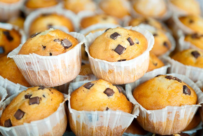 Muffins Stacked Together Butter and Chocolate in the Foreground Stock ...