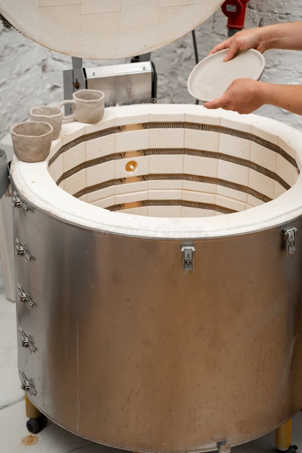 Muffle Furnace Functioning. Putting Ceramic Products in a Muffle ...