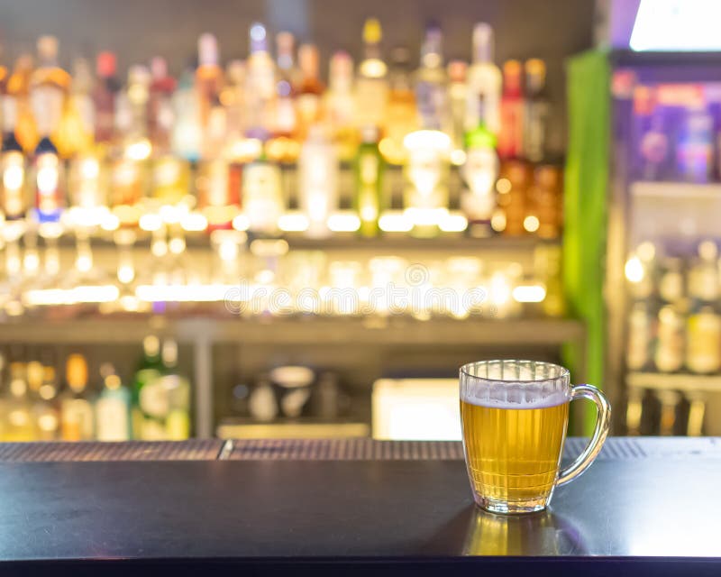 A Mug of Beer on the Bar Counter in a Pub. Stock Photo - Image of ...