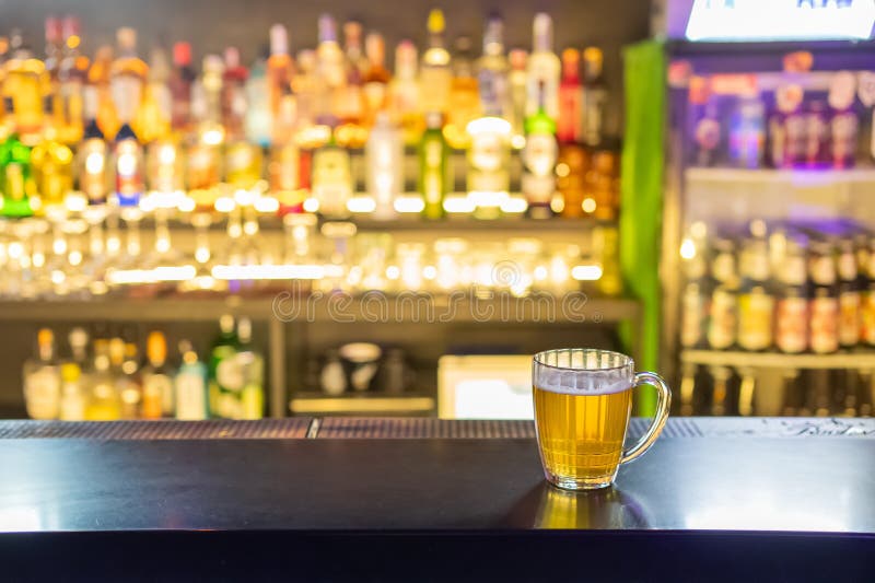 A Mug of Beer on the Bar Counter in a Pub. Stock Photo - Image of ...