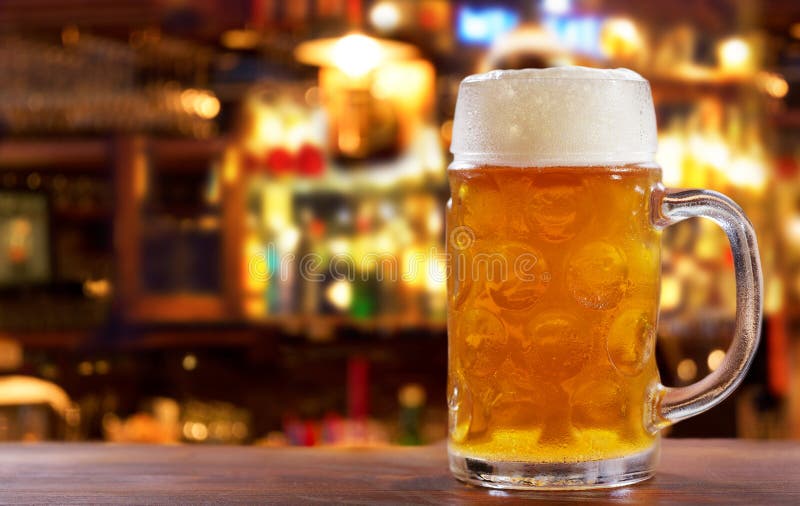 Mug of Beer in a Bar on Wooden Counter Stock Photo - Image of menu ...
