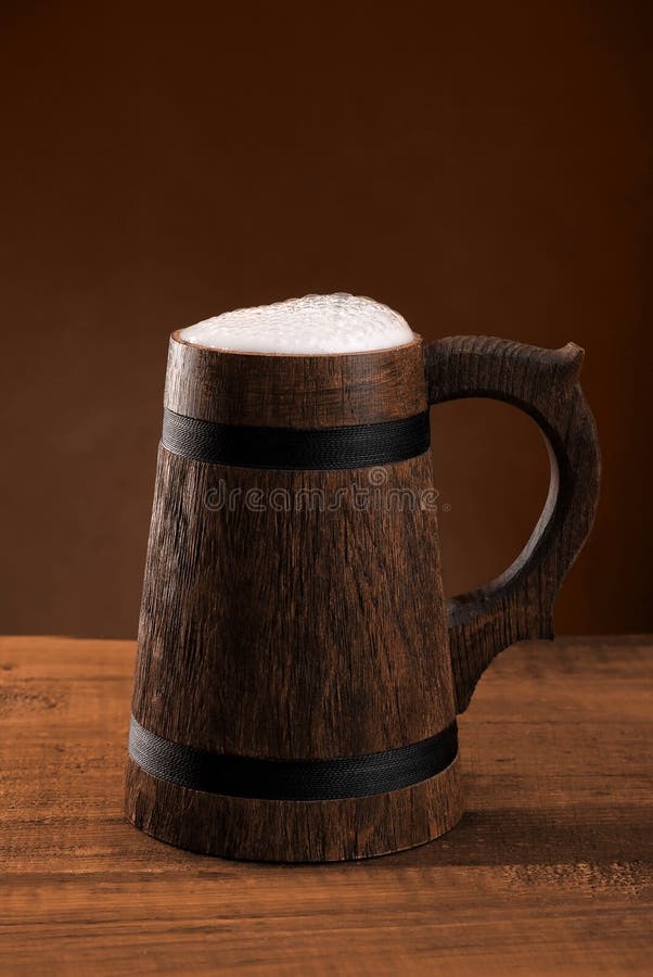 Mug Beer with a Cap of Foam on a Dark Background Stock Image - Image of ...