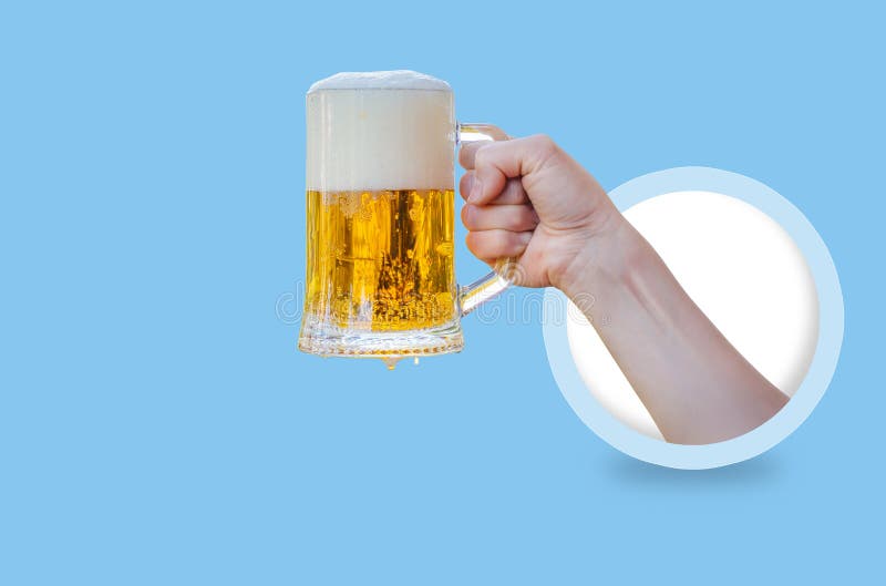 A mug of beer in hand stock photo. Image of cold, froth - 91553060