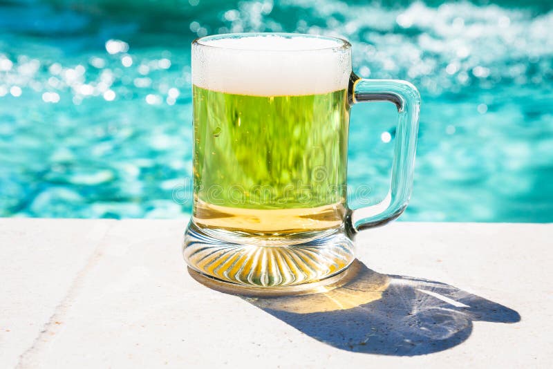 Mug of Cold Beer on the Outdoor Pool Stock Photo - Image of cold, drink ...