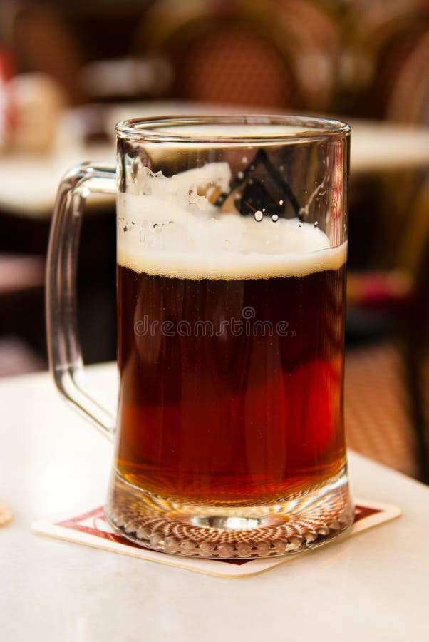 Mug of dark beer close up stock image. Image of lager - 23178911