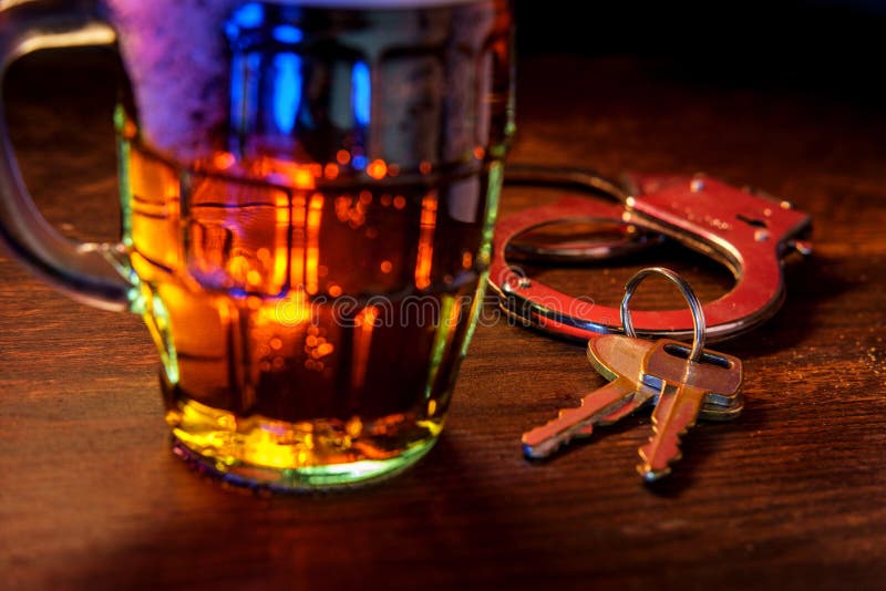 Alcohol Keys Handcuffs stock photo. Image of alcoholism - 198877504
