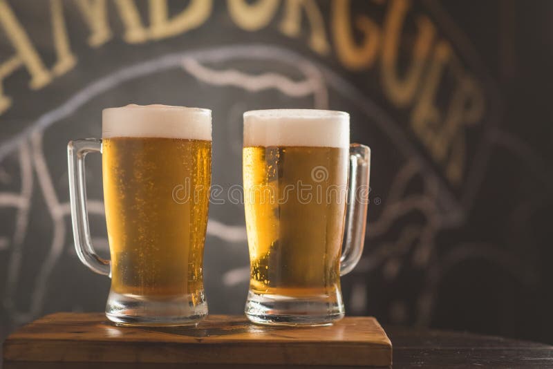 Mug Full of Chopp, with Chopp Pilsen on a Rustic Table. Stock Image ...