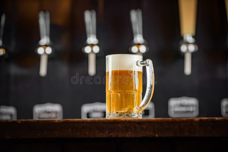 Mug Full of Chopp, with Chopp Pilsen on a Rustic Table. Stock Image ...