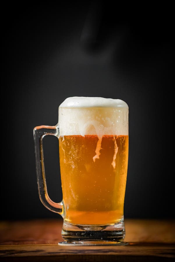 Mug Full of Chopp, with Chopp Pilsen on a Rustic Table. Stock Photo ...