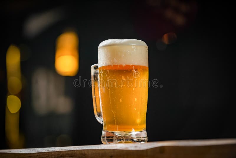 Mug Full of Chopp, with Chopp Pilsen on a Rustic Table. Stock Photo ...