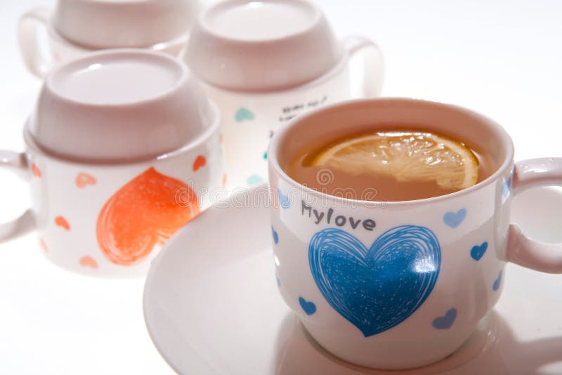 A Mug of Lemon Tea and a Few Inverted Cups Stock Photo - Image of ...