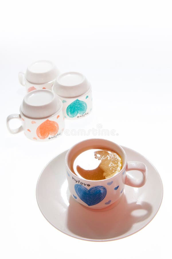 A Mug of Lemon Tea and a Few Inverted Cups Stock Photo - Image of ...