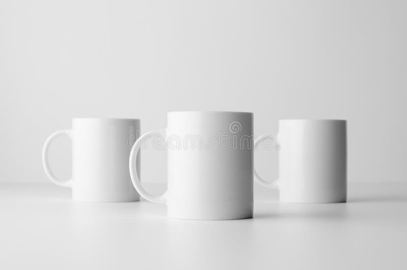 Mug Mock-Up - Three Mugs stock image. Image of light - 205218843