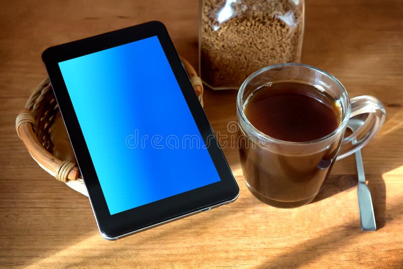 Mug of Morning Coffee and Tablet on Table Stock Photo - Image of ...