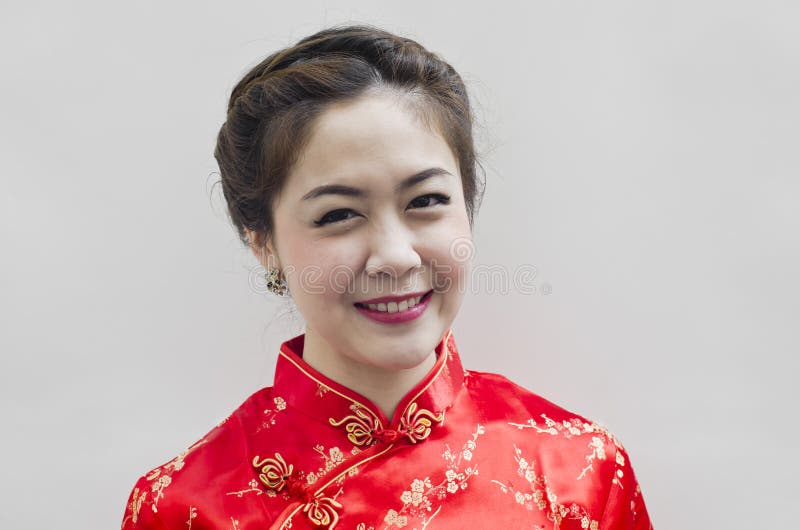 La Mujer China Sonriente Que Se Sostenía Se Levantó Imagen de archivo ...