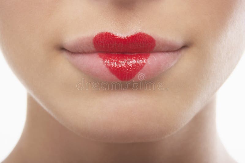 Mujer Con El Corazón Pintado En Los Labios Foto de archivo - Imagen de ...