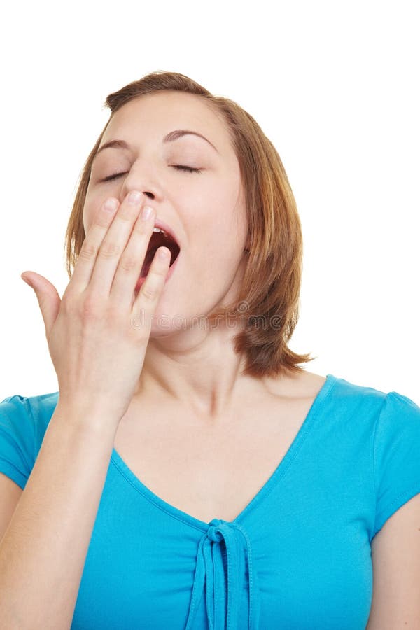 Mujer de bostezo cansada imagen de archivo. Imagen de aburrido - 25222771