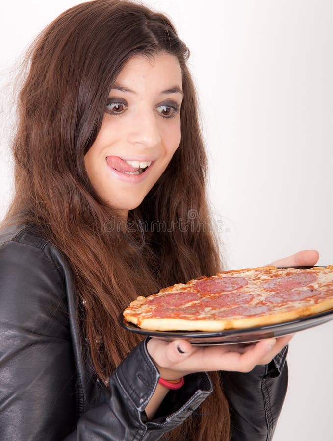 Mujer Hambrienta Que Sostiene Una Pizza Foto de archivo - Imagen de ...