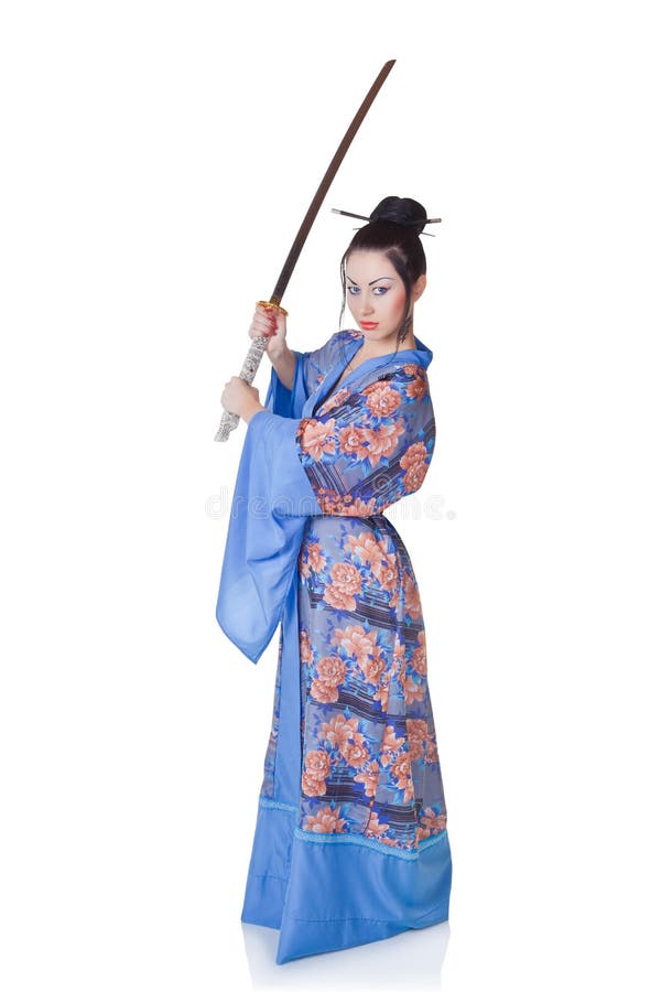 Mujer Hermosa En Un Kimono Con La Espada Del Samurai Foto de archivo ...