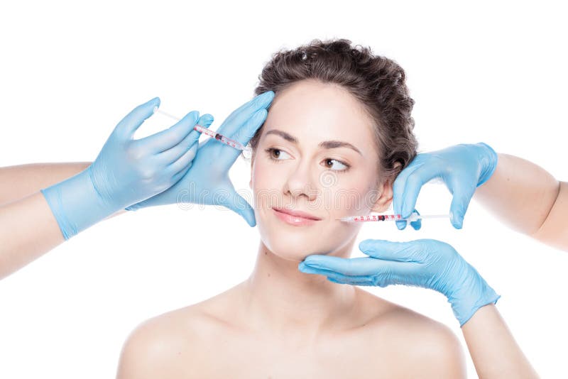 Joven Mujer Recibiendo Inyecciones De Bótox En El Rostro Foto de ...